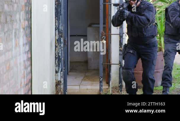 Front view of caucasian soldiers conduct military exercise at military ...