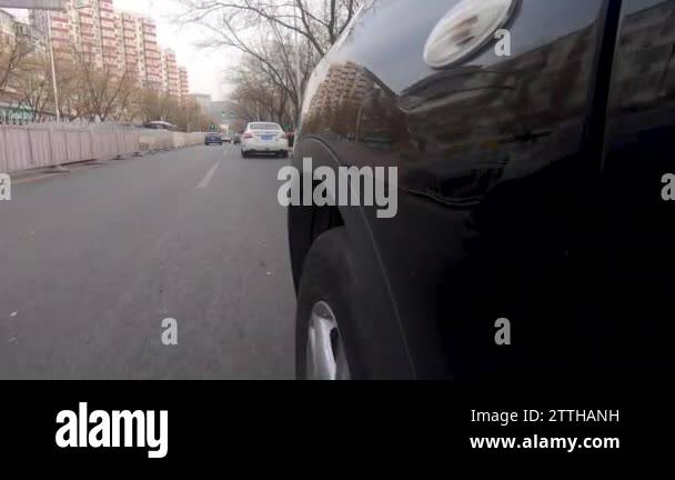 Driving view from side view of the car with reflection on the window ...