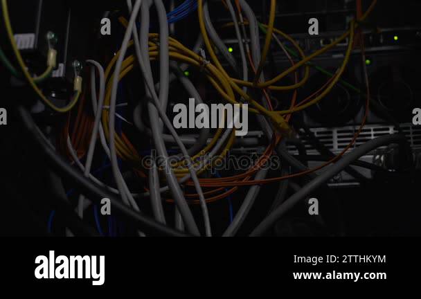 Tangled wires, power cables in datacenter, cleaning up server room ...