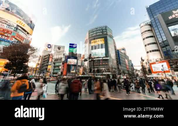 4K UHD time-lapse of Shibuya crossing, crowded people and car traffic ...