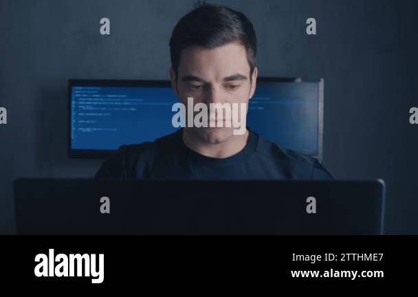 Experienced Programmer Developer Works On A New Program Young Man Writes The Source Code Of The
