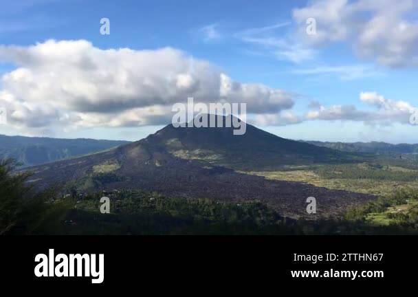 Clouds over the volcano Batur in Bali. This is one of the most ...