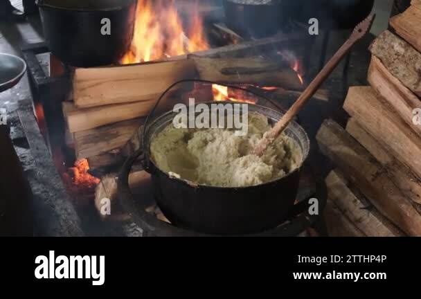 Boling and mixing a traditional hominy food Stock Video Footage - Alamy
