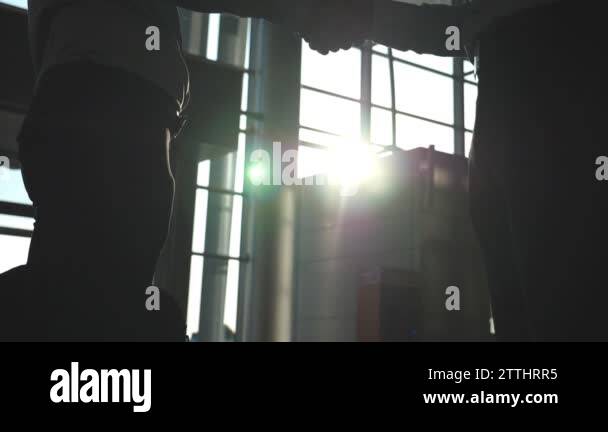 Friendly handshake of two businessmen greeting each other in office ...