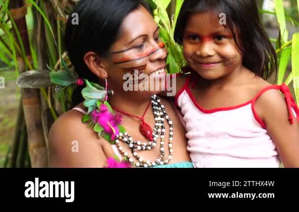 Mother and Daughter at an indigenous tribe in the Amazon Stock Video ...