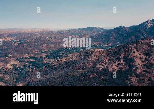 Cinema aerial panoramic video of the view of mountain formations in ...