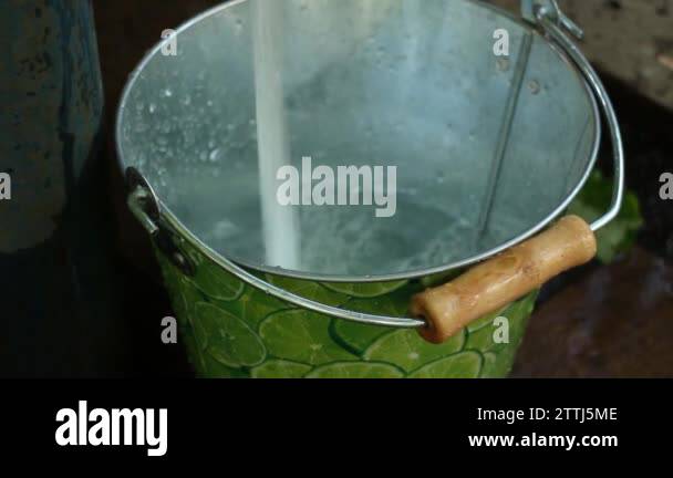Fill the bucket Stock Videos & Footage - HD and 4K Video Clips - Alamy