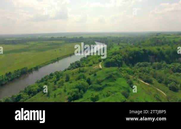 Aerial landscape of river between forest and field, Landscape with river, forest, clouds, blue ...