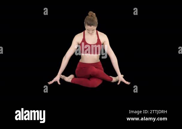 Yoga girl practicing nadi shodhana pranayama or Breathingin in ...