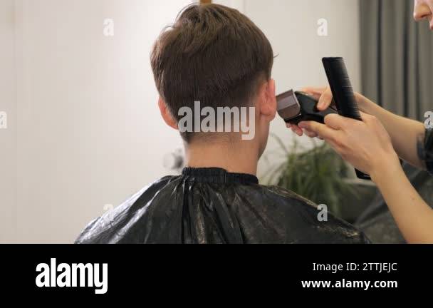 Female barber haircut doing Stock Videos & Footage - HD and 4K Video ...