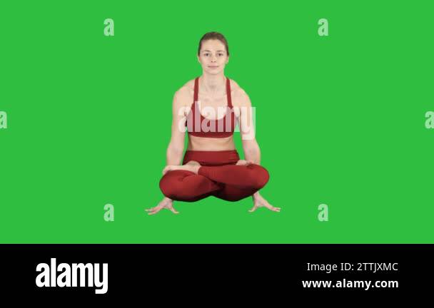 Tolasana or Scale Pose Beautiful woman do Yoga sitting arm lift posture ...