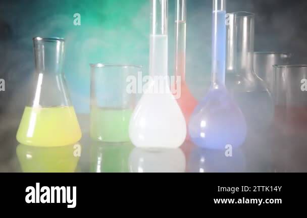 Pharmacy and chemistry theme. Test glass flask with solution in ...