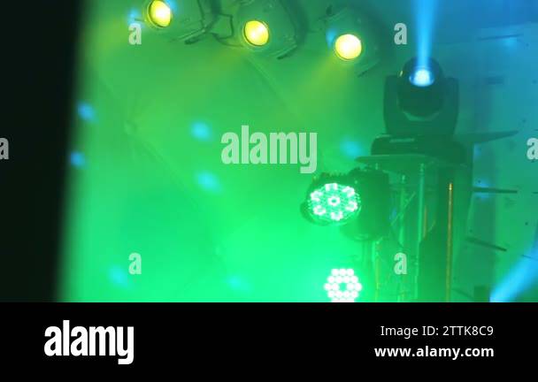 Stage lights at the concert with fog, Stage lights on a console ...