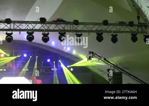 Stage lights at the concert with fog, Stage lights on a console ...