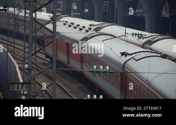 overlook two train slowly staggered passing,intercity traffic in china ...