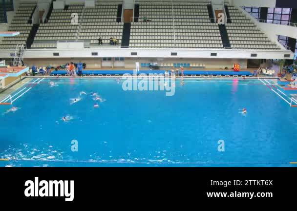 Teams play waterpolo in pool of sports complex, time lapse Stock Video ...