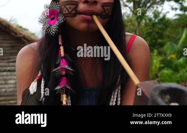 Indigenous Woman Smoking Pipes in a Tupi Guarani Tribe, Brazil Stock ...