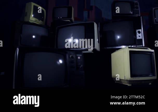 Retro Tv Turns On Green Screen In The Middle Of Many Tvs. You can ...