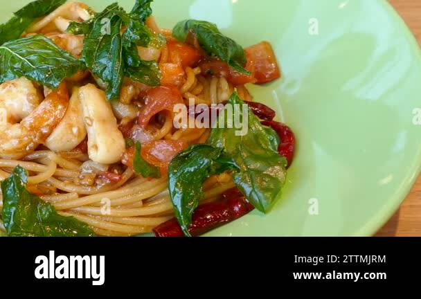 Spaghetti with spicy seafood Stock Video Footage - Alamy