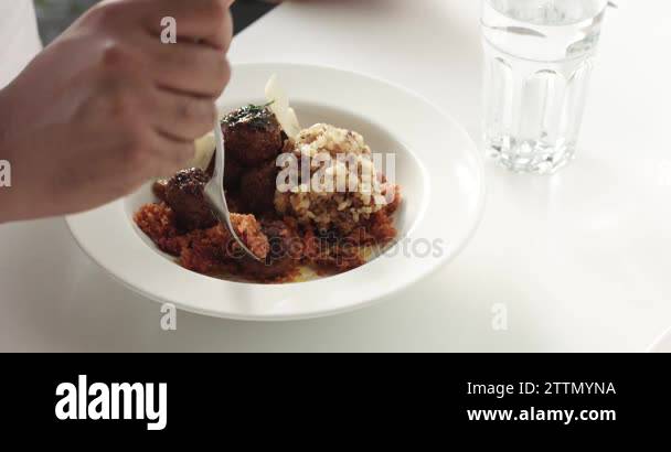 Close up of dark skinned man eating dinner Stock Video Footage - Alamy