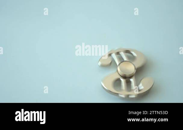 Rotating spinner in the form of a dollar. Spinner rotates and stops ...