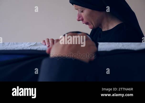 funeral, sadness and mourning concept - sad woman talking and crying ...