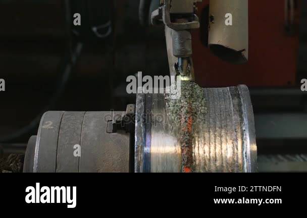 Welding robots apply overlay weld protection on the pipe disks ...