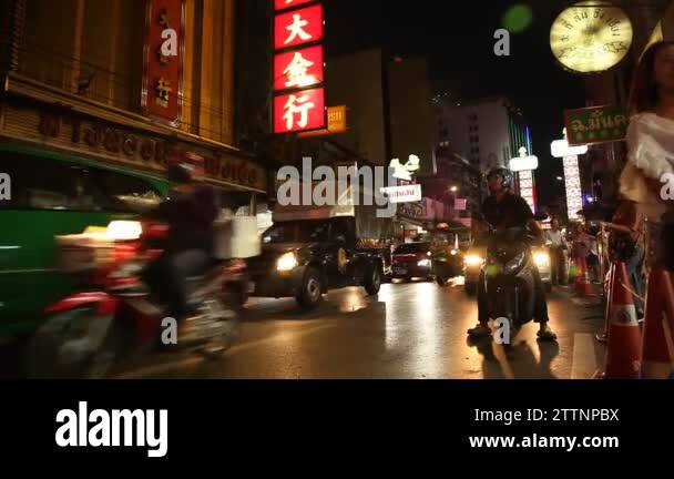 BANGKOK, THAILAND - Dec 15 2018: Cars and shops on Yaowarat road. Chinatown with notable Chinese ...