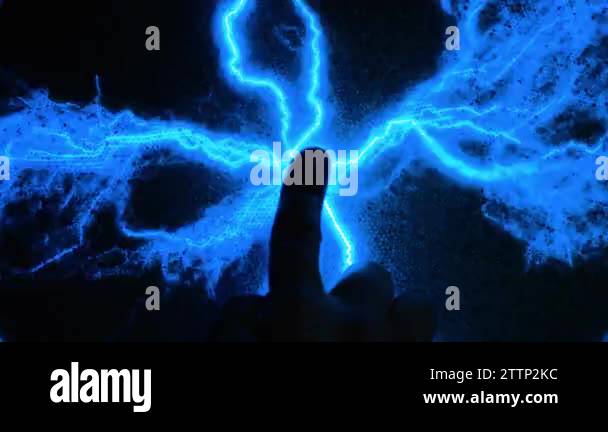 Abstract blue lightning. A man touches his hand to electricity. Aura ...