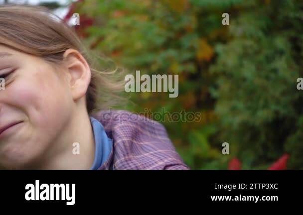Portrait of a boy who is punched on the face slow motion. Slow movement of the fist in the face ...
