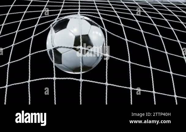 Soccer Ball flies into Goal Net in Slow Motion. Bottom View. Beautiful ...