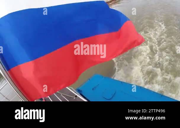 Russian flag at the stern of a floating ship Stock Video Footage - Alamy