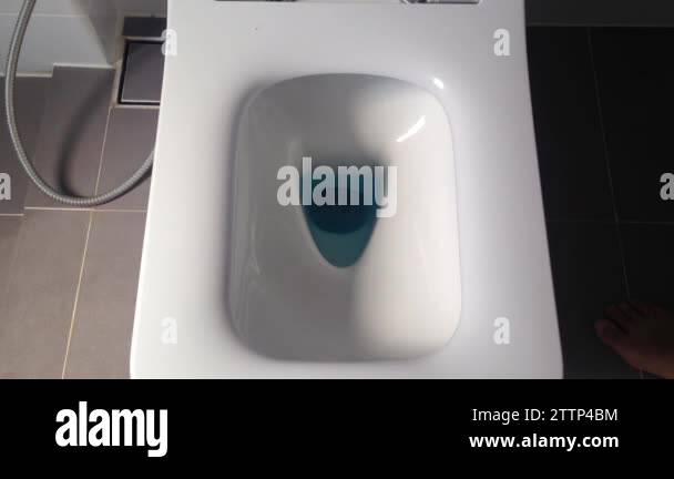 Toilet Flushed Top Down View. Close-up view of a Water flushing down ...