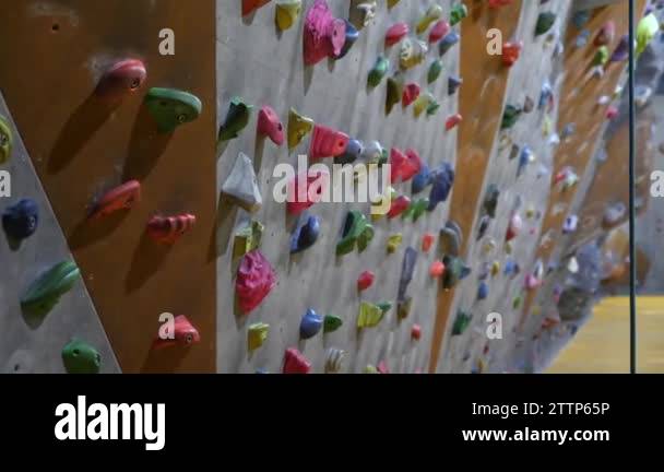 Empty indoor climbing wall in a bouldering climbing center Stock Video ...