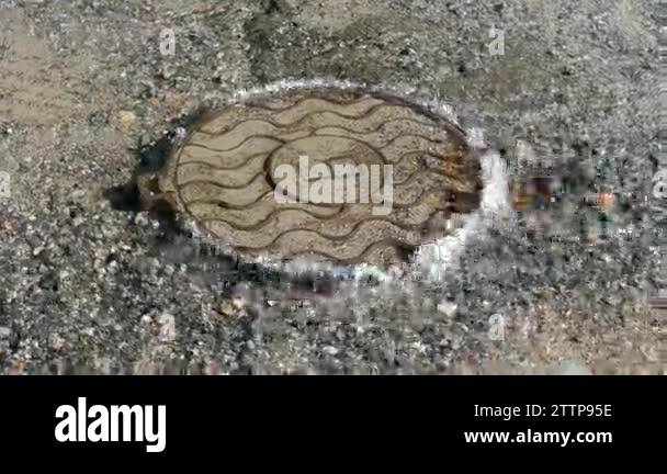 Outflow of water from the aqueduct. Breakthrough of the water supply ...