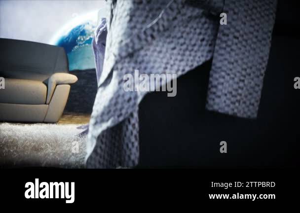 funny alien watching TV on the sofa on the moon. Living on the moon ...