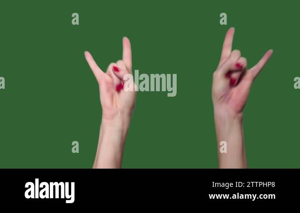 Green screen. Chromakey. Hands at a rock concert. Horns. That rocks ...