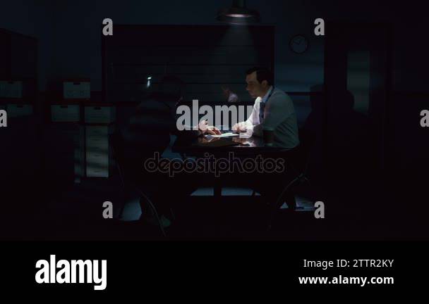 4K Criminal in handcuffs being interrogated by police detective Stock ...