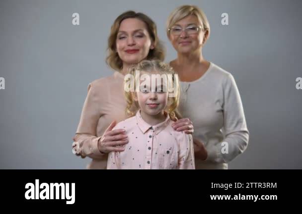 Woman female women family grandmother child hugging Stock Videos ...