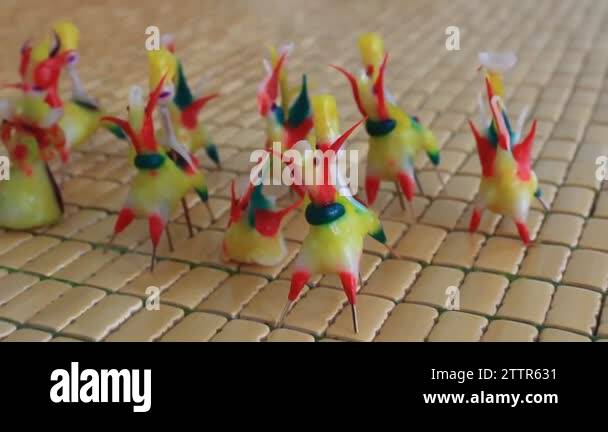 Tohe, the traditional toys in Vietnam made by colored rice powder Stock ...