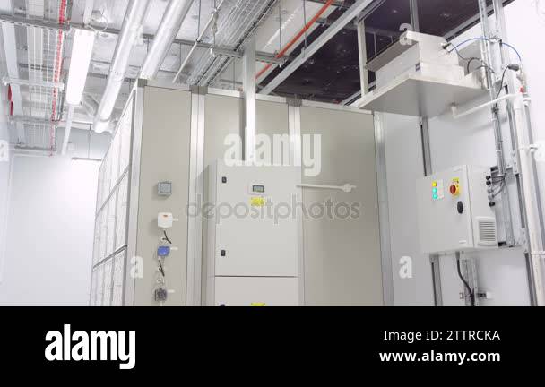 Empty interior of control room in a data centre with power supply and ...