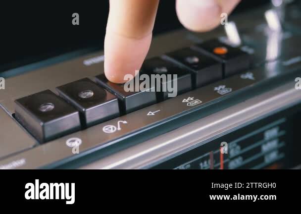 Pushing Play Button on a Vintage Tape Recorder. Transistor retro radio ...