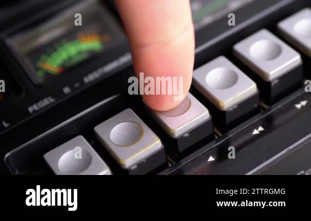 Pushing Play Button on a Vintage Tape Recorder. Transistor retro radio ...