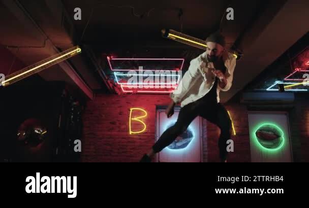 Freestyle dancer shows amazing choreography dance on the bar table ...