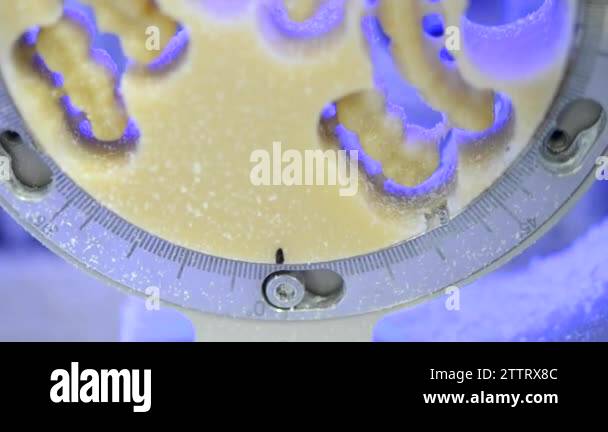 Dental milling machine carving out shape of human teeth Stock Video ...