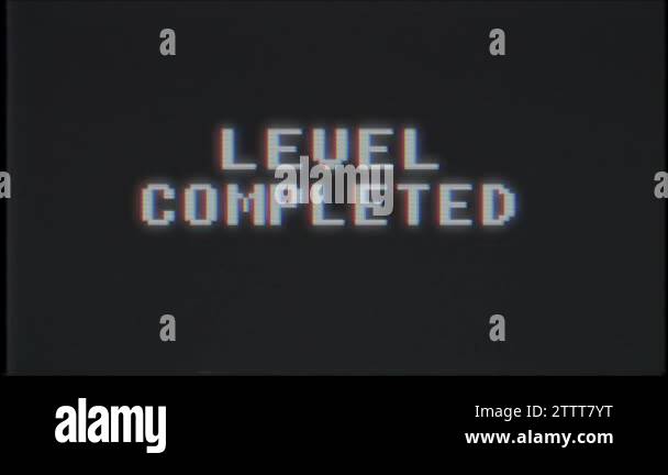 retro videogame LEVEL COMPLETED text on computer old tv glitch ...