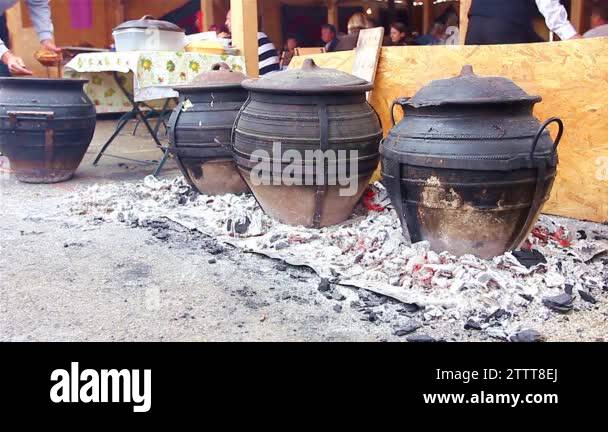 Ceramic cooking pots Stock Videos & Footage - HD and 4K Video Clips - Alamy