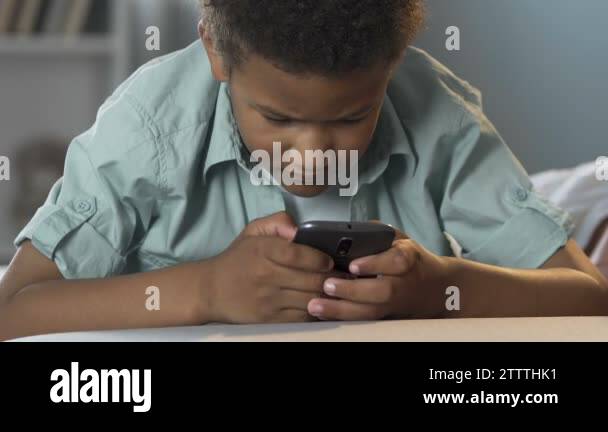 Child cell phone addiction Stock Videos & Footage - HD and 4K Video ...