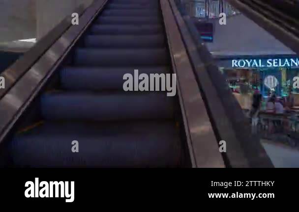 KUALA LUMPUR, MALAYSIA - JANUARY 2016: famous petronas towers suria klcc mall walking by circa ...