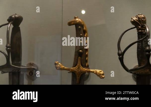 Medieval weapon arms in the form of pikes and swords in the castle ...